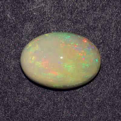 12.93ctw 23.20x15.70x8.8mm Oval Multi Color Opal Translucent Surface ...