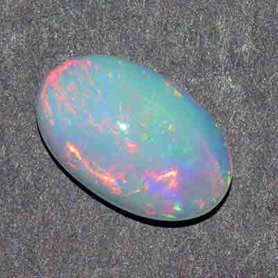 12.93ctw 23.20x15.70x8.8mm Oval Multi Color Opal Translucent Surface ...